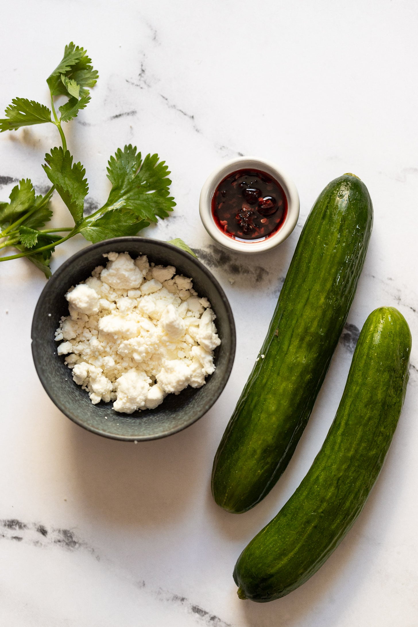 Spicy Smashed Cucumber Snack with Goat Cheese