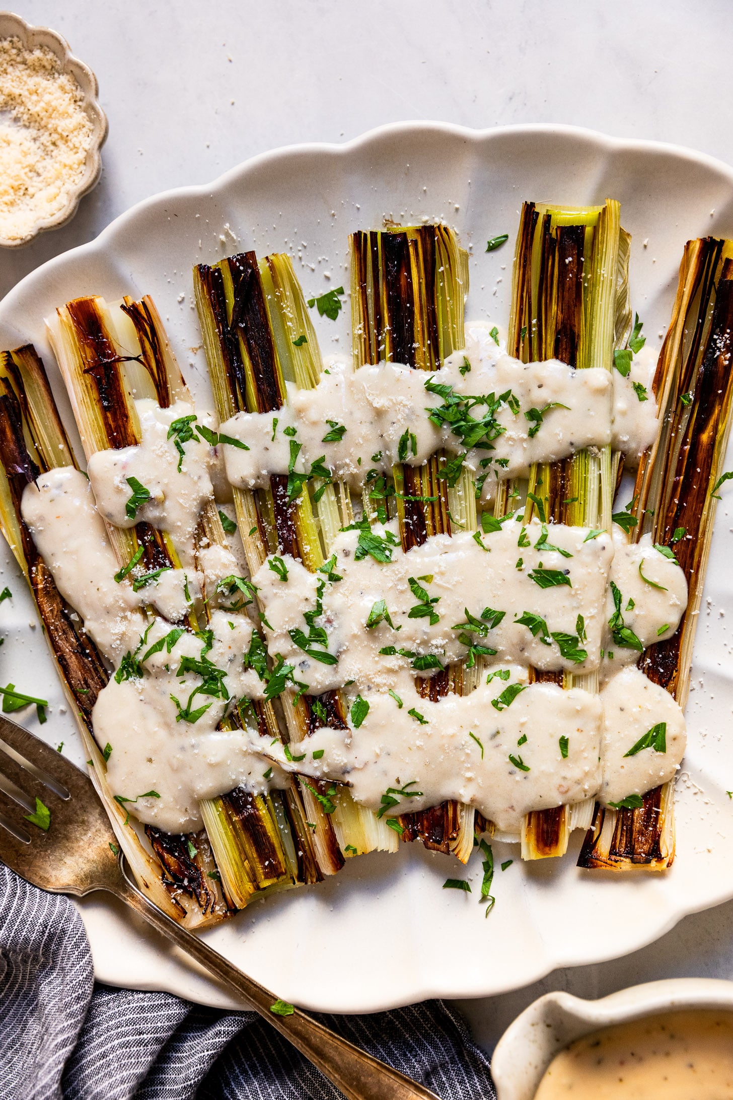 Oven Roasted Leeks with Parmesan Garlic Sauce